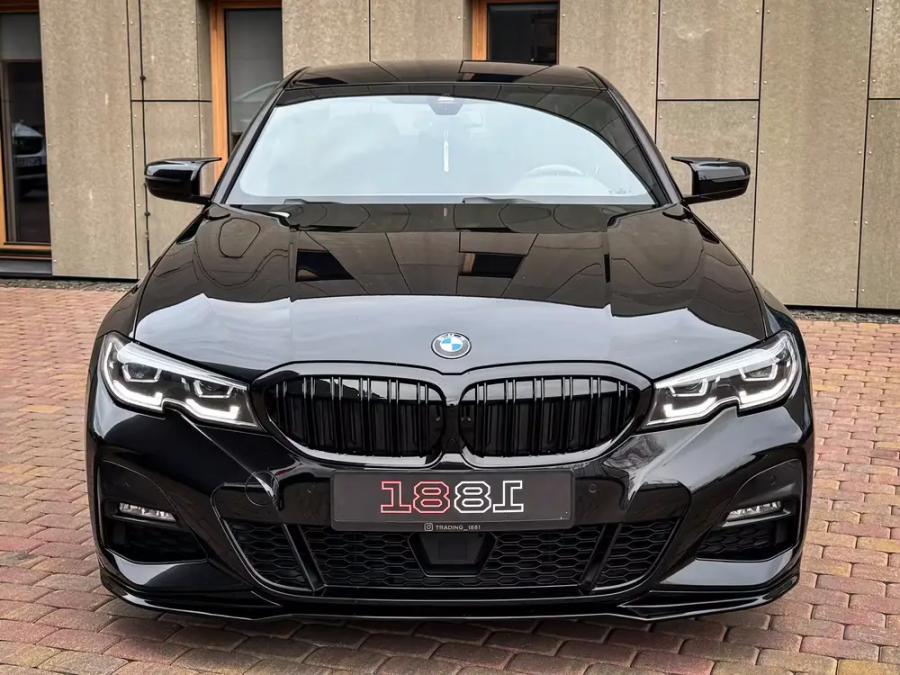 Black BMW 320 2021 in Riga, with an engine capacity of 2.00 L and mileage of 167 thousand km for 20500 €, photo 7 on AUTOMOTO.COM.LV