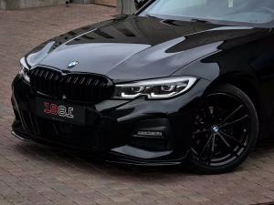 Black BMW 320 2021 in Riga, with an engine capacity of 2.00 L and mileage of 167 thousand km for 20500 €, photo 8 on AUTOMOTO.COM.LV