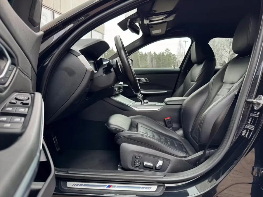 Black BMW 320 2021 in Riga, with an engine capacity of 2.00 L and mileage of 167 thousand km for 20500 €, photo 10 on AUTOMOTO.COM.LV