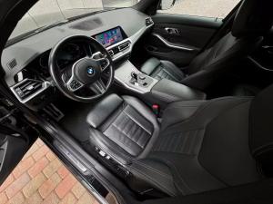 Black BMW 320 2021 in Riga, with an engine capacity of 2.00 L and mileage of 167 thousand km for 20500 €, photo 11 on AUTOMOTO.COM.LV