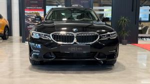 Black BMW 320 2021 in Riga, with an engine capacity of 2.00 L and mileage of 64 thousand km for 28890 €, photo 3 on AUTOMOTO.COM.LV