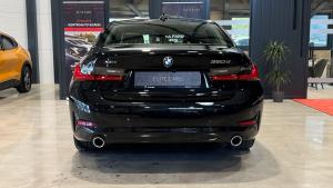 Black BMW 320 2021 in Riga, with an engine capacity of 2.00 L and mileage of 64 thousand km for 28890 €, photo 4 on AUTOMOTO.COM.LV