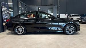 Black BMW 320 2021 in Riga, with an engine capacity of 2.00 L and mileage of 64 thousand km for 28890 €, photo 7 on AUTOMOTO.COM.LV