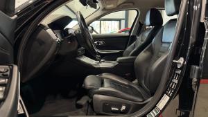 Black BMW 320 2021 in Riga, with an engine capacity of 2.00 L and mileage of 64 thousand km for 28890 €, photo 8 on AUTOMOTO.COM.LV
