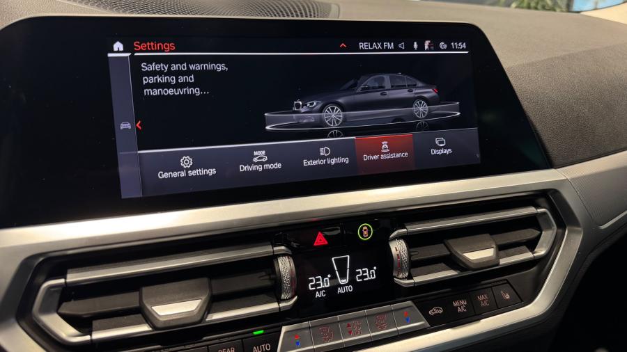 Black BMW 320 2021 in Riga, with an engine capacity of 2.00 L and mileage of 64 thousand km for 28890 €, photo 16 on AUTOMOTO.COM.LV