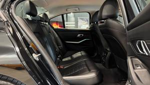 Black BMW 320 2021 in Riga, with an engine capacity of 2.00 L and mileage of 64 thousand km for 28890 €, photo 21 on AUTOMOTO.COM.LV