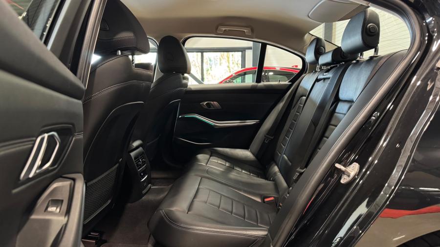 Black BMW 320 2021 in Riga, with an engine capacity of 2.00 L and mileage of 64 thousand km for 28890 €, photo 23 on AUTOMOTO.COM.LV