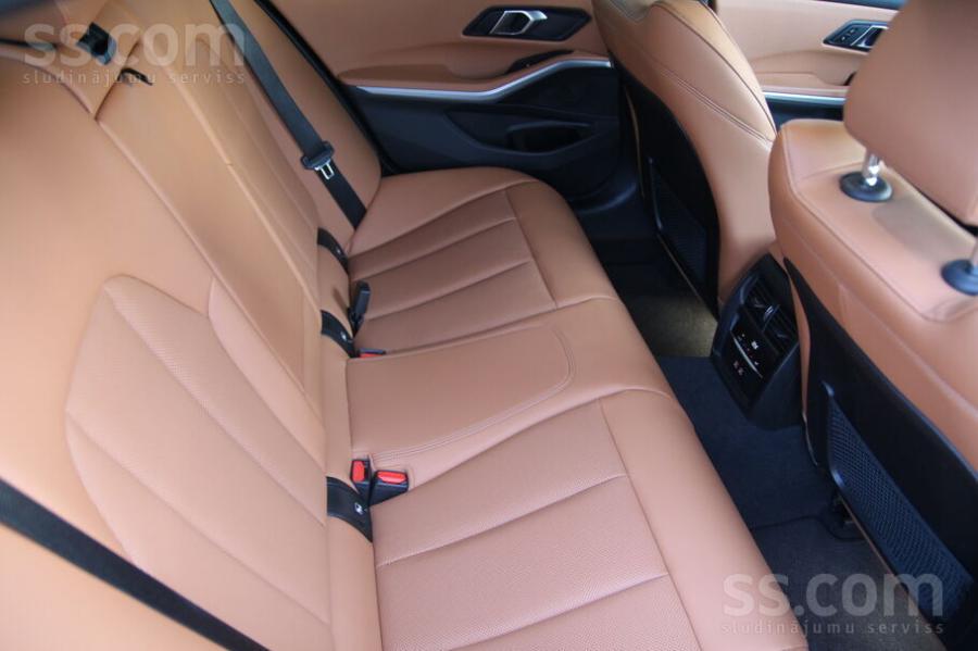 Black BMW 320 2022 in Riga, with an engine capacity of 2.00 L and mileage of 133 thousand km for 31900 €, photo 9 on AUTOMOTO.COM.LV