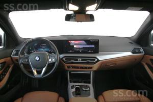 Black BMW 320 2022 in Riga, with an engine capacity of 2.00 L and mileage of 133 thousand km for 31900 €, photo 12 on AUTOMOTO.COM.LV