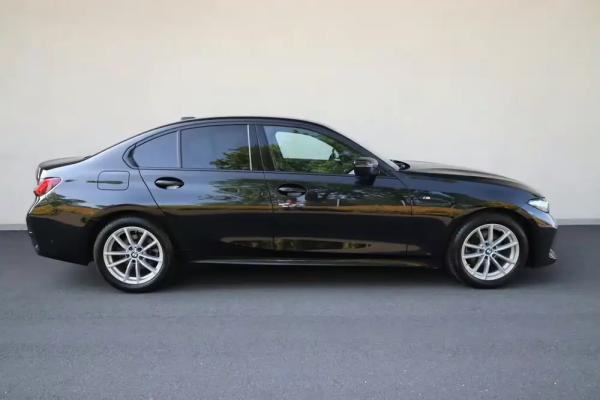 Black BMW 320 2022 in Riga, with an engine capacity of 2.00 L and mileage of 0 thousand km for 19990 €, photo 4 on AUTOMOTO.COM.LV