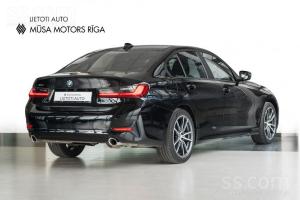 Black BMW 320 2022 in Riga, with an engine capacity of 2.00 L and mileage of 134 thousand km for 26500 €, photo 3 on AUTOMOTO.COM.LV
