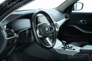 Black BMW 320 2022 in Riga, with an engine capacity of 2.00 L and mileage of 134 thousand km for 26500 €, photo 4 on AUTOMOTO.COM.LV