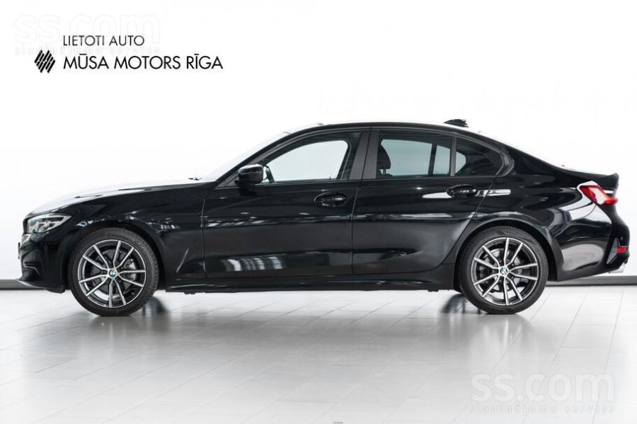 Black BMW 320 2022 in Riga, with an engine capacity of 2.00 L and mileage of 134 thousand km for 26500 €, photo 11 on AUTOMOTO.COM.LV