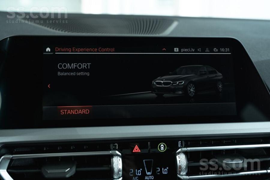 Black BMW 320 2022 in Riga, with an engine capacity of 2.00 L and mileage of 134 thousand km for 26500 €, photo 20 on AUTOMOTO.COM.LV