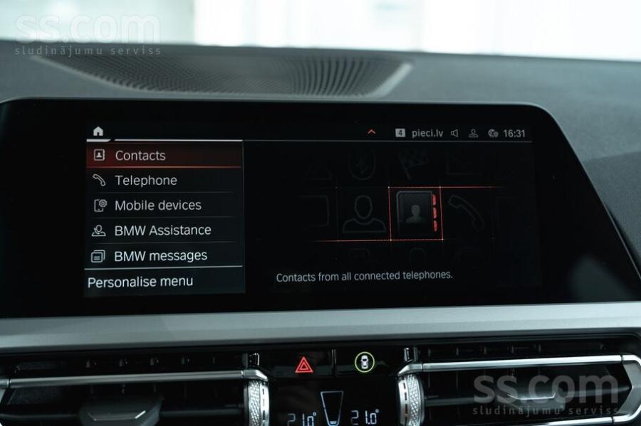 Black BMW 320 2022 in Riga, with an engine capacity of 2.00 L and mileage of 134 thousand km for 26500 €, photo 22 on AUTOMOTO.COM.LV