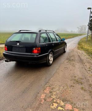 Black BMW 320 1995 in Riga, with an engine capacity of 2.00 L and mileage of 278 thousand km for 2200 €, photo 3 on AUTOMOTO.COM.LV