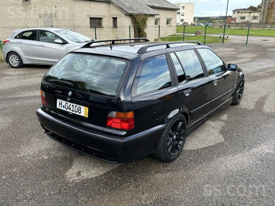 Melns BMW 320 1996 Valmiera, ar dzinēja tilpumu 2.00 L un nobraukumu 297 tūkst. km par 4900 €, foto 4 vietnē AUTOMOTO.COM.LV