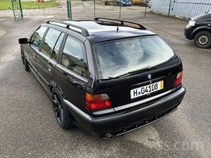 Melns BMW 320 1996 Valmiera, ar dzinēja tilpumu 2.00 L un nobraukumu 297 tūkst. km par 4900 €, foto 7 vietnē AUTOMOTO.COM.LV