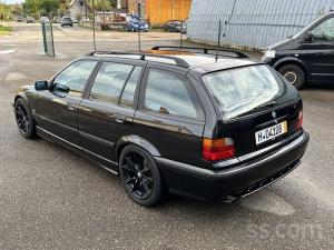Melns BMW 320 1996 Valmiera, ar dzinēja tilpumu 2.00 L un nobraukumu 297 tūkst. km par 4900 €, foto 8 vietnē AUTOMOTO.COM.LV