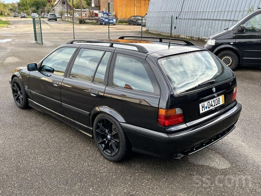 Melns BMW 320 1996 Valmiera, ar dzinēja tilpumu 2.00 L un nobraukumu 297 tūkst. km par 4900 €, foto 8 vietnē AUTOMOTO.COM.LV