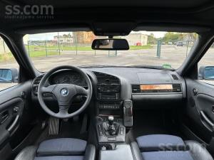 Melns BMW 320 1996 Valmiera, ar dzinēja tilpumu 2.00 L un nobraukumu 297 tūkst. km par 4900 €, foto 24 vietnē AUTOMOTO.COM.LV