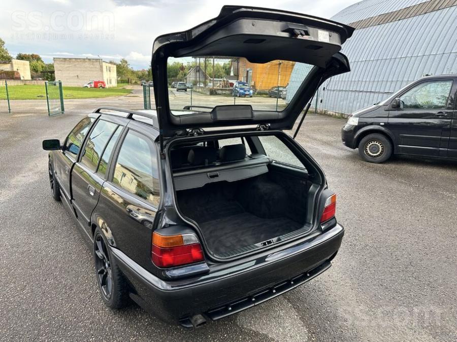 Melns BMW 320 1996 Valmiera, ar dzinēja tilpumu 2.00 L un nobraukumu 297 tūkst. km par 4900 €, foto 31 vietnē AUTOMOTO.COM.LV