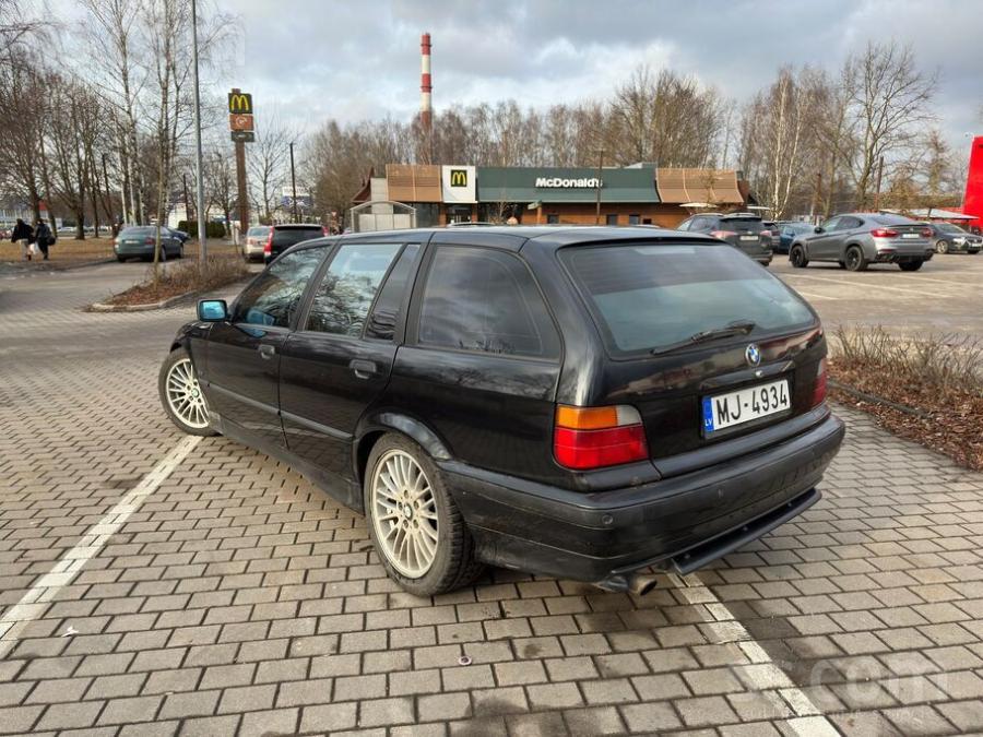 Black BMW 320 1997 in Riga, with an engine capacity of 2.00 L and mileage of 370 thousand km for 2390 €, photo 4 on AUTOMOTO.COM.LV