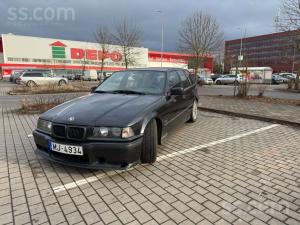 Black BMW 320 1997 in Riga, with an engine capacity of 2.00 L and mileage of 370 thousand km for 2390 €, photo 5 on AUTOMOTO.COM.LV