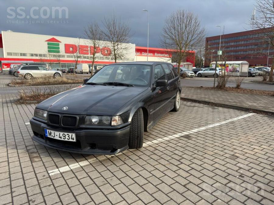 Black BMW 320 1997 in Riga, with an engine capacity of 2.00 L and mileage of 370 thousand km for 2390 €, photo 5 on AUTOMOTO.COM.LV