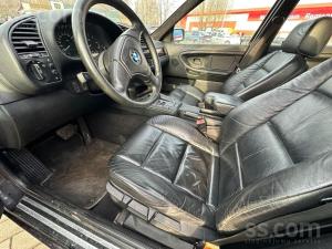 Black BMW 320 1997 in Riga, with an engine capacity of 2.00 L and mileage of 370 thousand km for 2390 €, photo 6 on AUTOMOTO.COM.LV