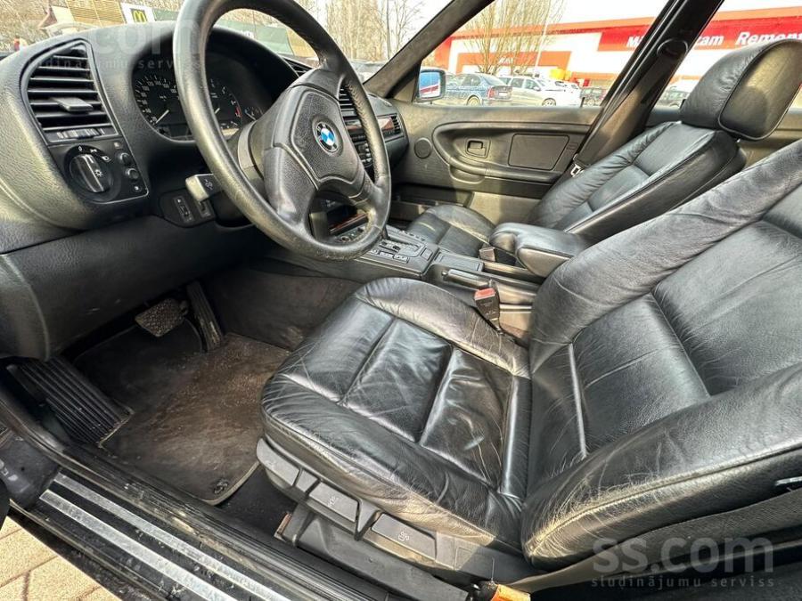 Black BMW 320 1997 in Riga, with an engine capacity of 2.00 L and mileage of 370 thousand km for 2390 €, photo 6 on AUTOMOTO.COM.LV