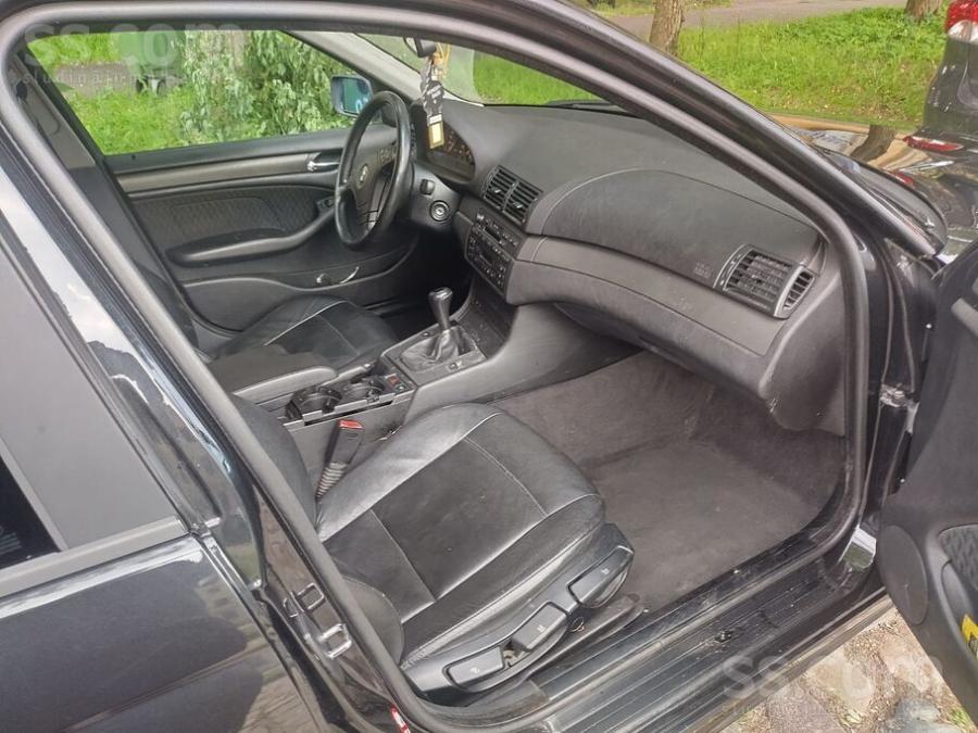 Black BMW 320 2000 in Riga, with an engine capacity of 2.00 L and mileage of 319 thousand km for 1850 €, photo 4 on AUTOMOTO.COM.LV