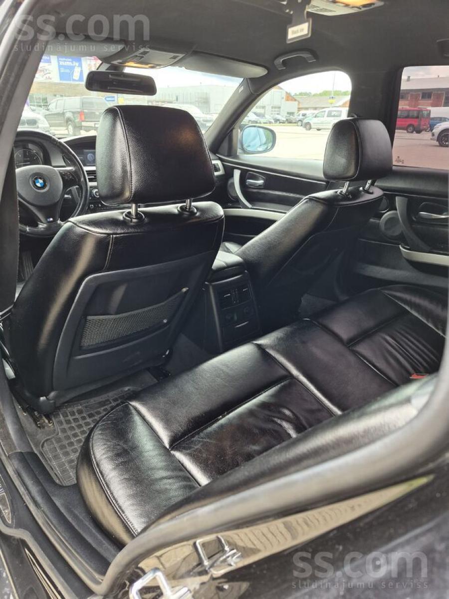 Black BMW 320 2008 in Riga, with an engine capacity of 2.00 L and mileage of 448 thousand km for 4700 €, photo 15 on AUTOMOTO.COM.LV