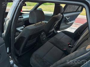 Black BMW 320 2009 in Riga, with an engine capacity of 2.00 L and mileage of 285 thousand km for 6690 €, photo 7 on AUTOMOTO.COM.LV