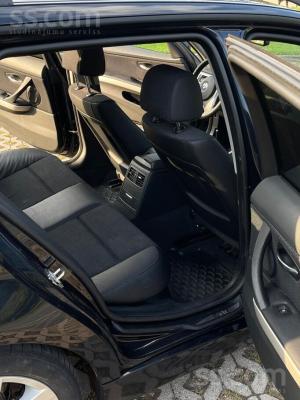 Black BMW 320 2009 in Cesis, with an engine capacity of 2.00 L and mileage of 298 thousand km for 3950 €, photo 6 on AUTOMOTO.COM.LV