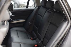 Black BMW 320 2010 in Riga, with an engine capacity of 2.00 L and mileage of 311 thousand km for 5990 €, photo 11 on AUTOMOTO.COM.LV