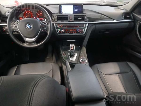 Black BMW 320 2012 in Riga, with an engine capacity of 2.00 L and mileage of 280 thousand km for 9495 €, photo 3 on AUTOMOTO.COM.LV