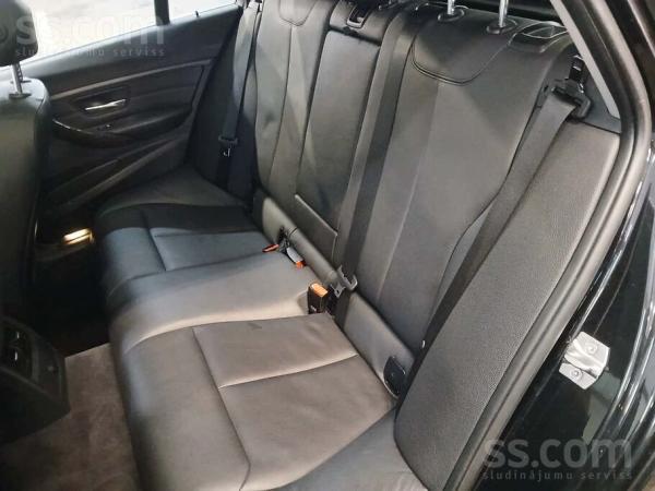 Black BMW 320 2012 in Riga, with an engine capacity of 2.00 L and mileage of 280 thousand km for 9495 €, photo 6 on AUTOMOTO.COM.LV