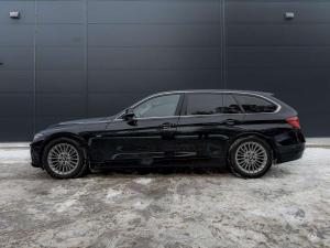 Black BMW 320 2012 in Riga, with an engine capacity of 2.00 L and mileage of 281 thousand km for 8888 €, photo 3 on AUTOMOTO.COM.LV