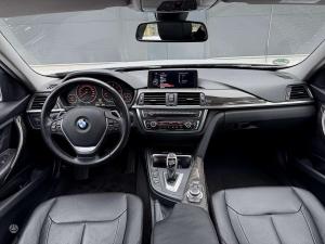 Black BMW 320 2012 in Riga, with an engine capacity of 2.00 L and mileage of 281 thousand km for 8888 €, photo 22 on AUTOMOTO.COM.LV