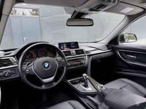 Black BMW 320 2012 in Riga, with an engine capacity of 2.00 L and mileage of 281 thousand km for 8888 €, photo 23 on AUTOMOTO.COM.LV