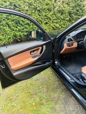 Black BMW 320 2012 in Valmiera, with an engine capacity of 2.00 L and mileage of 304 thousand km for 7800 €, photo 13 on AUTOMOTO.COM.LV