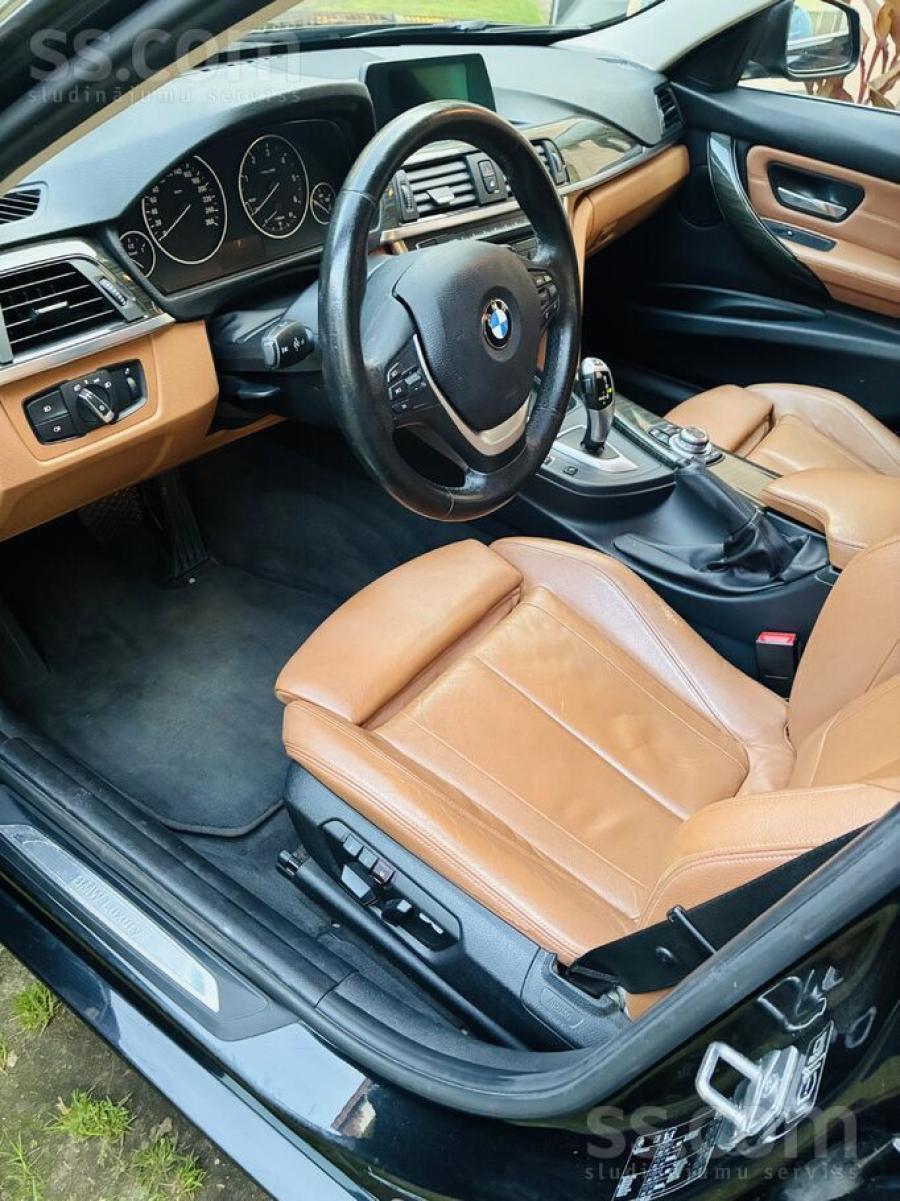 Black BMW 320 2012 in Valmiera, with an engine capacity of 2.00 L and mileage of 304 thousand km for 7800 €, photo 14 on AUTOMOTO.COM.LV