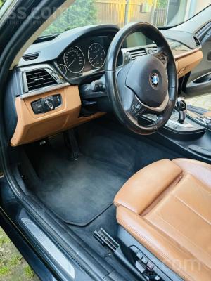 Black BMW 320 2012 in Valmiera, with an engine capacity of 2.00 L and mileage of 304 thousand km for 7800 €, photo 15 on AUTOMOTO.COM.LV
