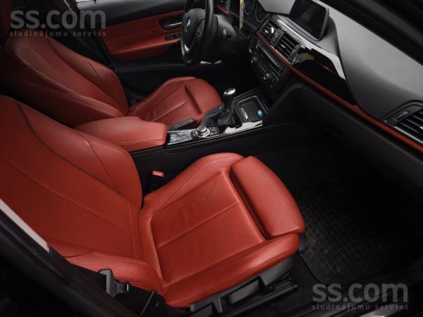 Black BMW 320 2012 in Jelgava, with an engine capacity of 2.00 L and mileage of 266 thousand km for 7700 €, photo 3 on AUTOMOTO.COM.LV