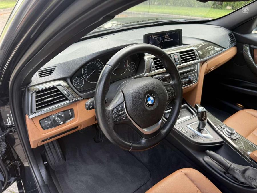 Black BMW 320 2012 in Marijampole, with an engine capacity of 2.00 L and mileage of 278 thousand km for 8200 €, photo 11 on AUTOMOTO.COM.LV