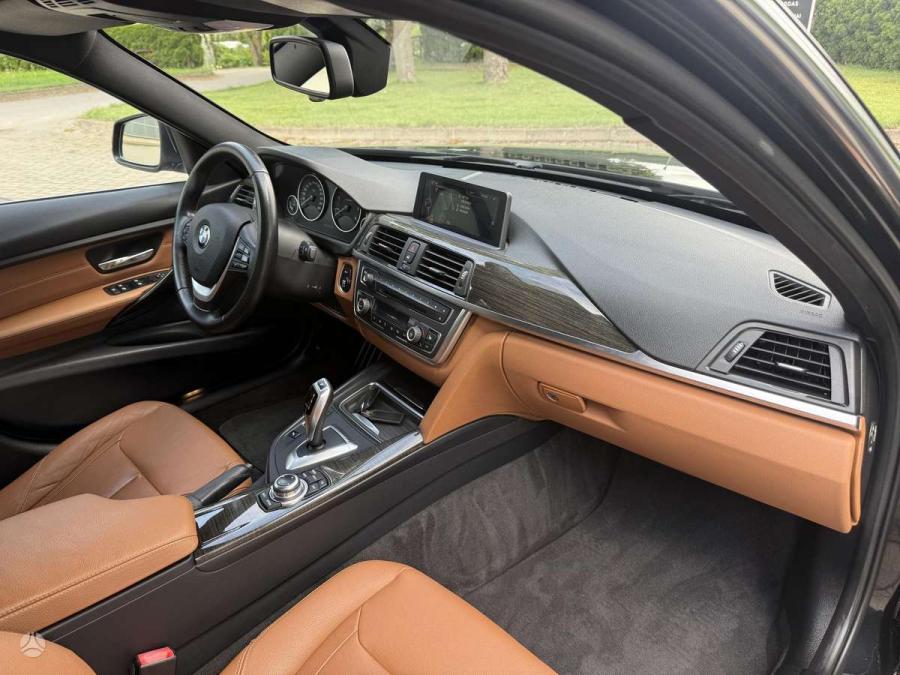 Black BMW 320 2012 in Marijampole, with an engine capacity of 2.00 L and mileage of 278 thousand km for 8200 €, photo 12 on AUTOMOTO.COM.LV