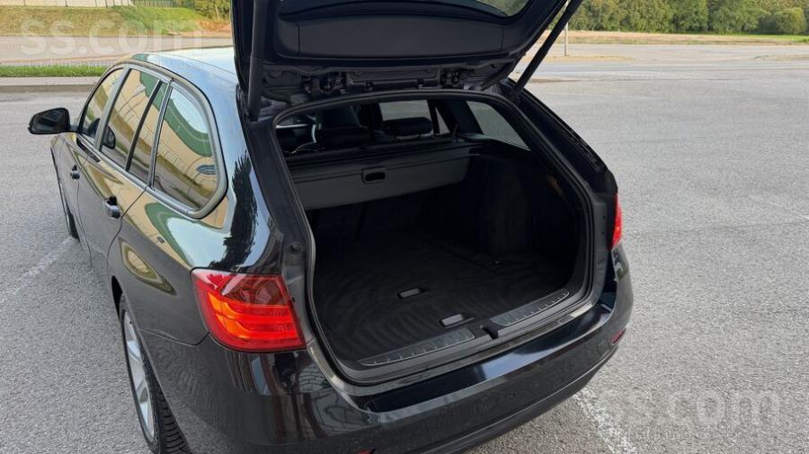 Black BMW 320 2012 in Valmiera, with an engine capacity of 2.00 L and mileage of 310 thousand km for 7900 €, photo 15 on AUTOMOTO.COM.LV