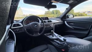 Black BMW 320 2012 in Valmiera, with an engine capacity of 2.00 L and mileage of 310 thousand km for 7900 €, photo 19 on AUTOMOTO.COM.LV