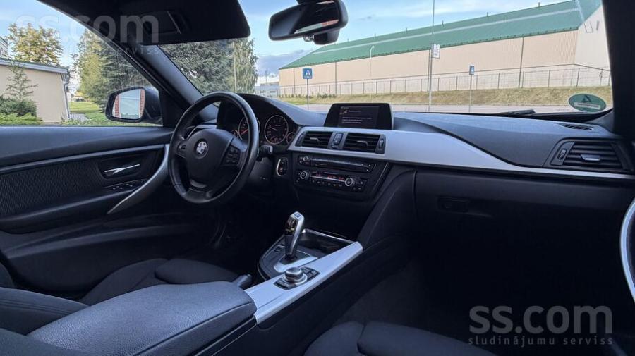 Black BMW 320 2012 in Valmiera, with an engine capacity of 2.00 L and mileage of 310 thousand km for 7900 €, photo 20 on AUTOMOTO.COM.LV